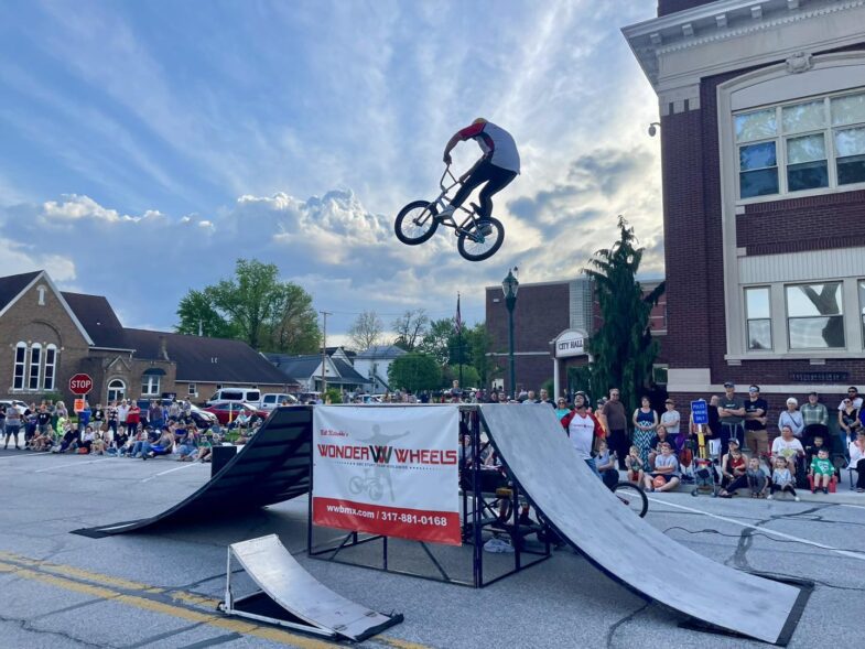 May First Friday draws record crowd with thrilling BMX Stunts - Columbia City Connect